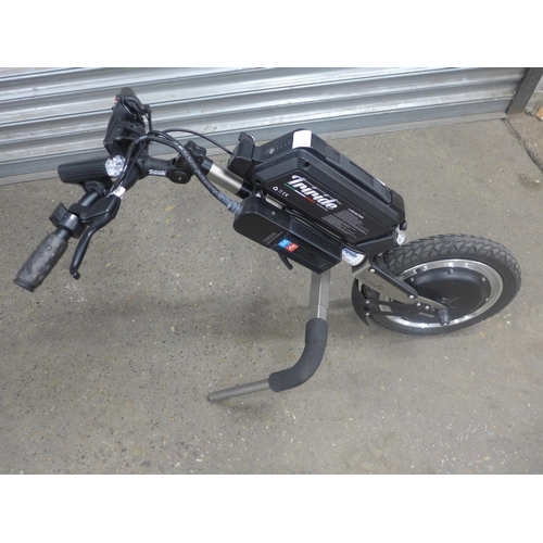 A Triride electric wheelchair attachment with Li-ion battery