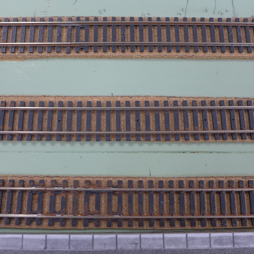 A model railway station with decorative back drop and 2 boxes of ...