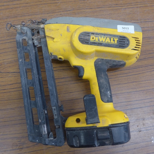 A DeWalt DC305, 36V reciprocating saw, a DeWalt DC618, 18V nail gun and ...