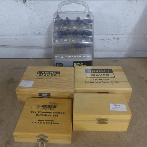 A quantity of tool bit sets in wooden cases, including drill sink set ...