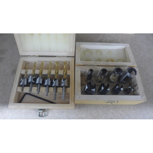 A quantity of tool bit sets in wooden cases, including drill sink set ...
