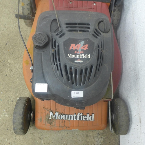 A Mountfield M4 petrol driven lawn mower with a Briggs and Stratton ...