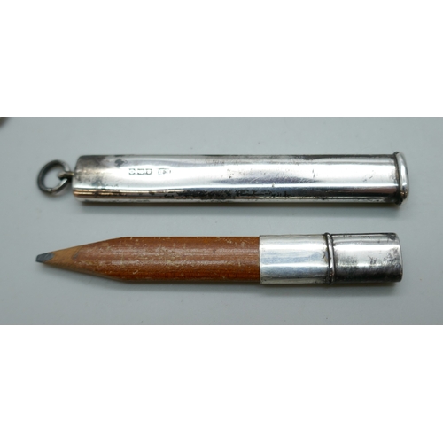 A silver pin dish, Birmingham 1911 hallmarks, two pairs of silver tongs ...