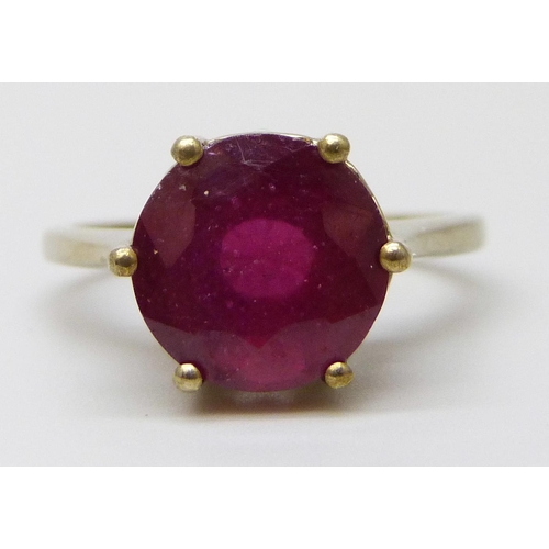 A silver gilt ring set with a large ruby, 3.6g, N