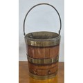 A 19th Century Dutch fruitwood and brass peat bucket