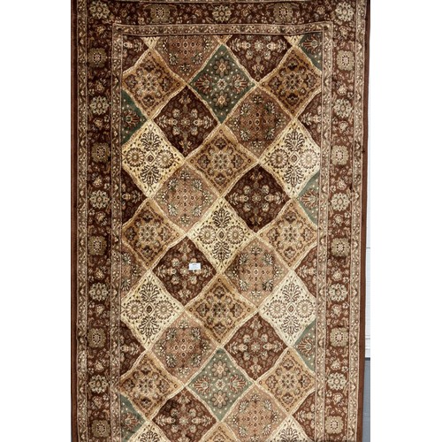 A multi coloured ground cashmere rug with all over design, 2m x 1m