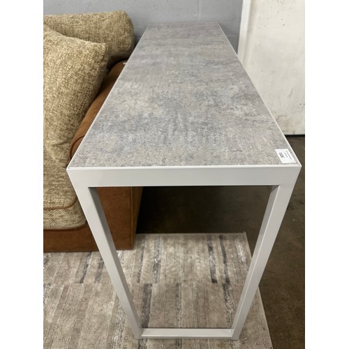 A white and grey marble effect console table