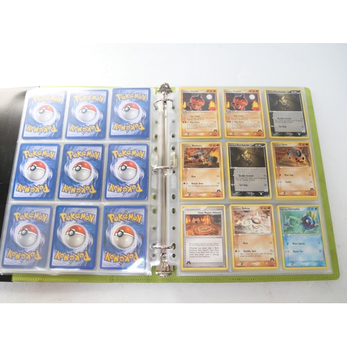 A Vault-X binder of vintage Pokémon cards including Base Set Fossil and Jungle, Team Rocket, Neo-Gen