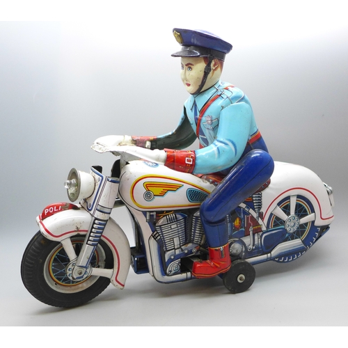 A circa. 1960s Japanese TM Modern Toys Highway Patrol / Police Speed ...