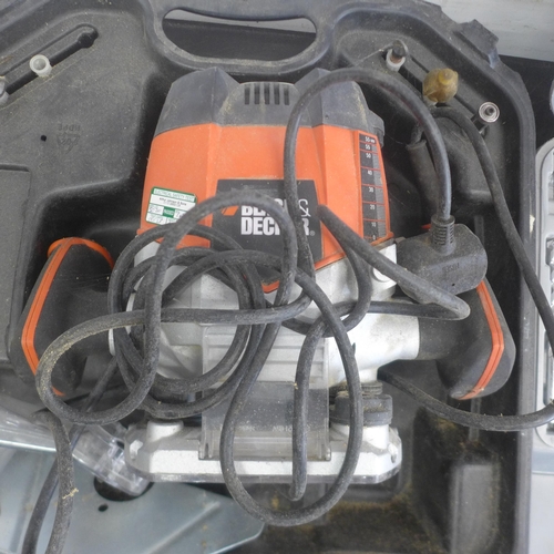 A Black and Decker KW900E, 240V router and a large drill bit set