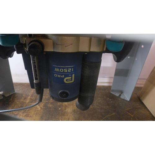 A Wolfcraft router table with Performance Pro router mounted