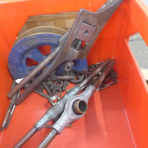 A tap and die set, a Record pipe bender and assorted drill bits