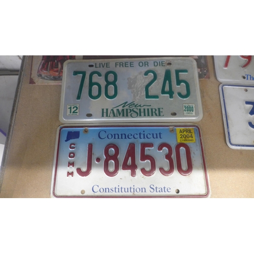 6 Assorted vintage style tin metal signs including 5 American number ...