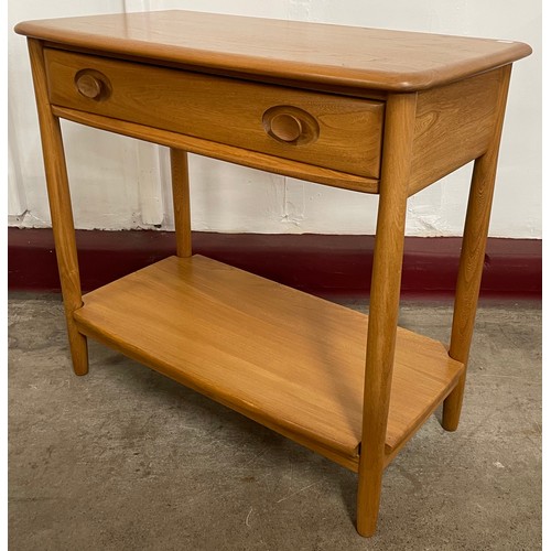 An Ercol Blonde ash single drawer Windsor hall table
