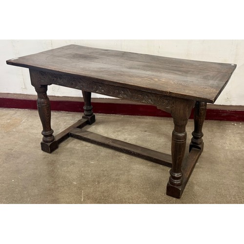 A 17th Century and later carved oak refectory table