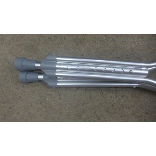 A set of Drive Devilbiss healthcare aluminium under arm crutches