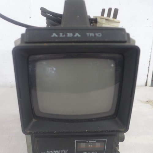 An Alba black and white TV with 3B and AM/FM radio - model TR-10
