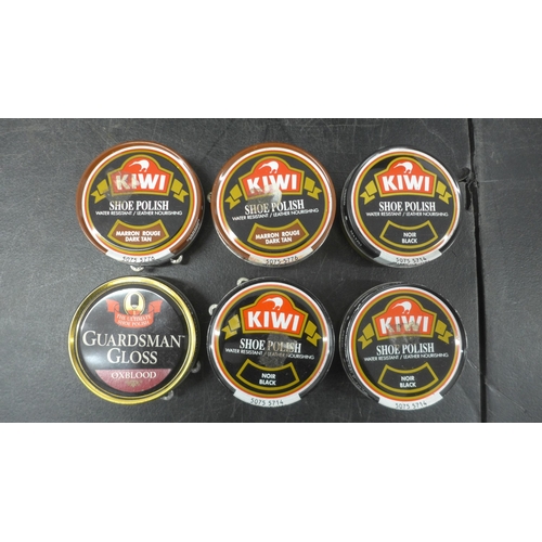 A quantity of boot polishing items including brushes, Kiwi shoe polish ...