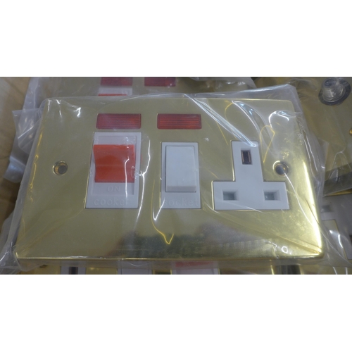 Approximately 60 polished brass electrical faceplate switches ...