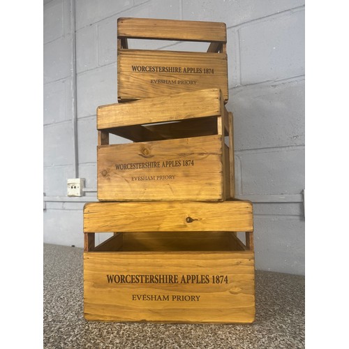 A set of three graduated apple boxes