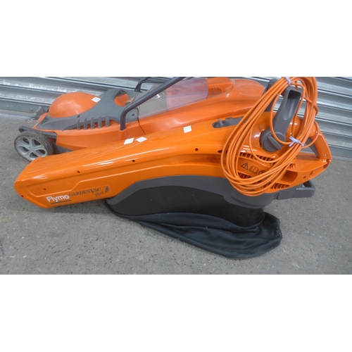A Flymo Chevron 34vc electric lawnmower and a Flymo garden vac plus ...