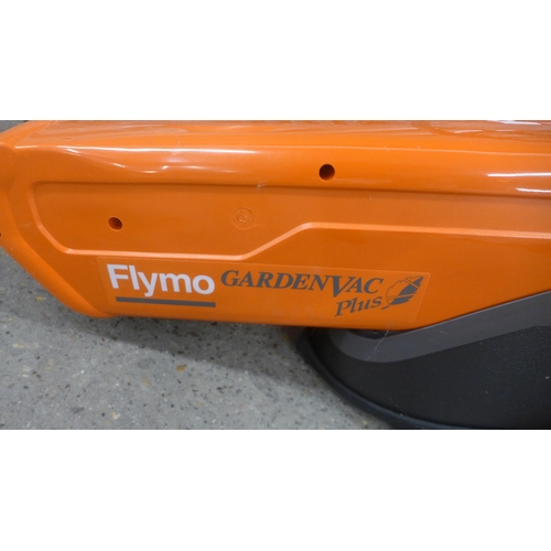 A Flymo Chevron 34vc electric lawnmower and a Flymo garden vac plus ...