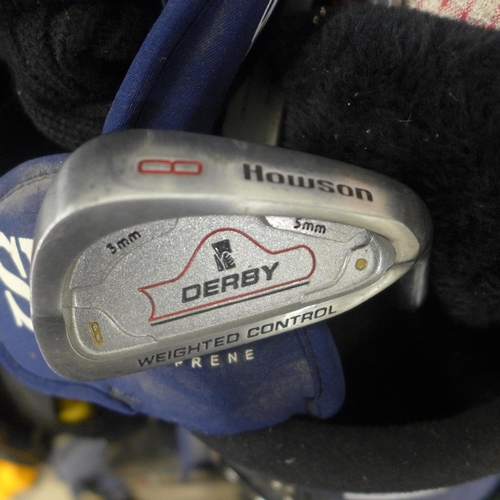 A Howson golf bag with clubs and a Brosnan golf bag with Rapier clubs