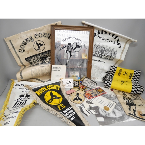 A collection of 1970s Notts County memorabilia including badges ...