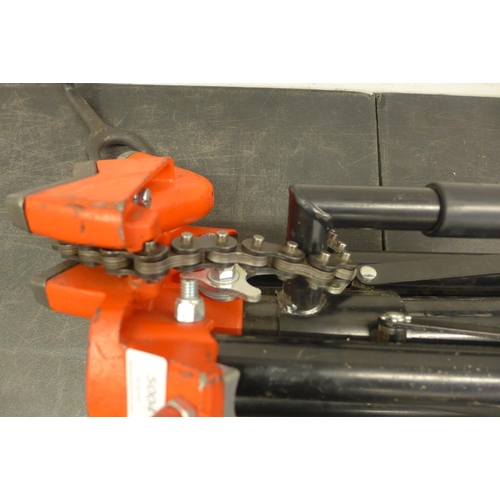 A Ridgid 425 threading machine pipe cutter with tripod stand