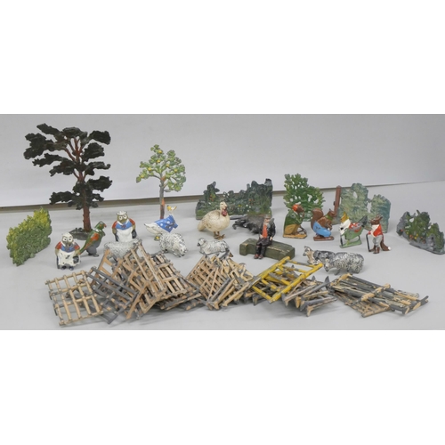 A collection of toy lead figures, farm animals, trees, fences ...