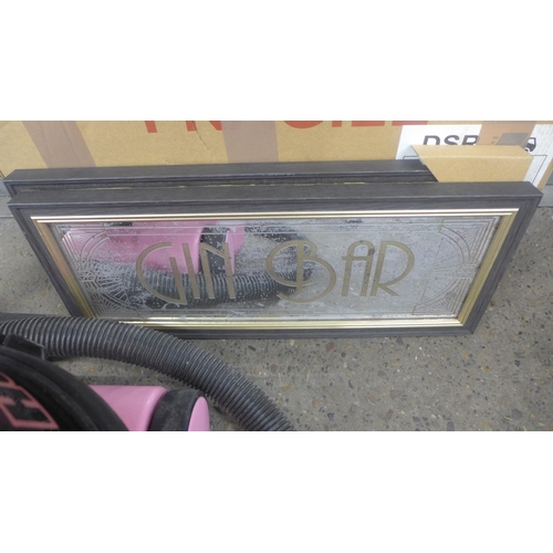 A pink Numatic Hetty Hoover with pipe and attachment and 2 x gin bar ...