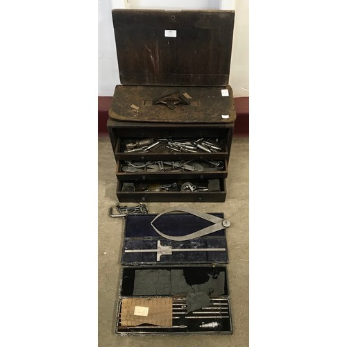 An early 20th Century oak engineers chest, containing assorted tools