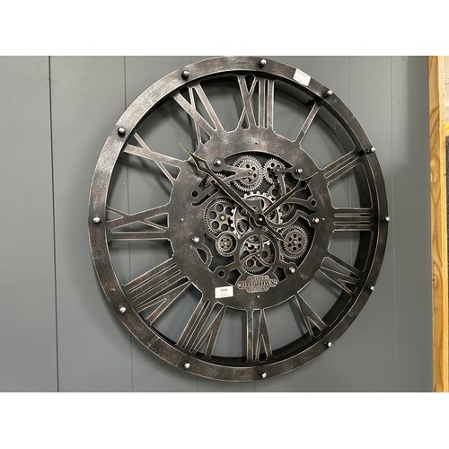 A industrial style "Old Town" circular moving gear clock