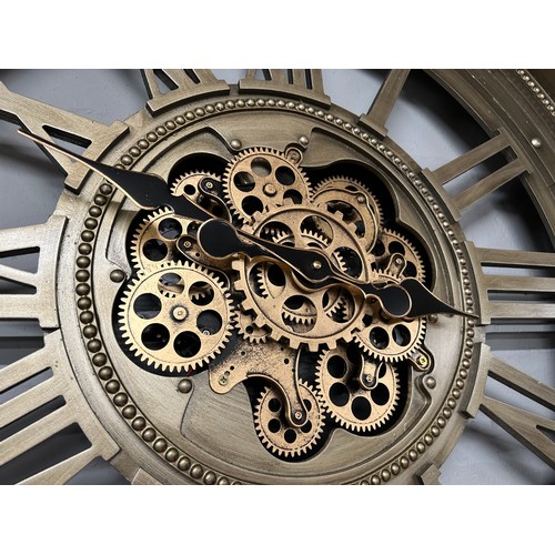 A large circular moving gear clock