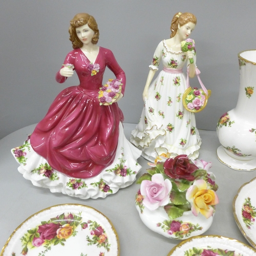 A collection of Royal Albert Old Country Rose figures and other ...