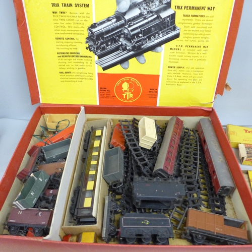A collection of Tri-ang model railway, carriages, wagons and track, in ...