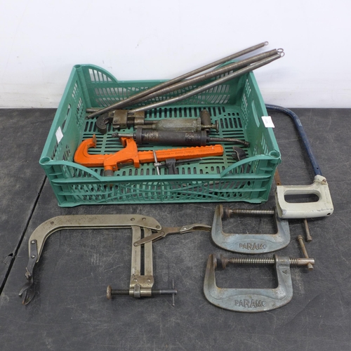 3 plumber springs, a large pipe cutter, various vices, 2 grease guns etc.