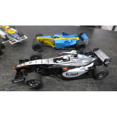 A Scalextric Renault F1 team track set and cars and a Scalextric F1 X3 ...