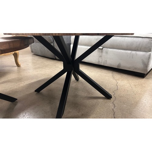 Two graduated Java sleeper wood and black metal circular coffee/side tables