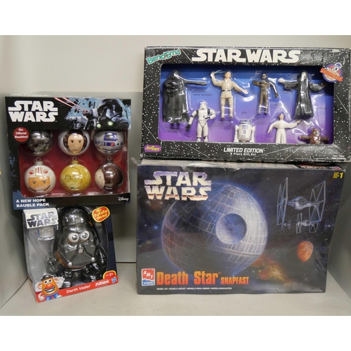 An AMT Ertl Snapfast Death Star model kit (8193), a 1998 Justoys Bend ...
