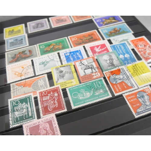 Stamps; A box of stamps, covers, etc - loose and in albums