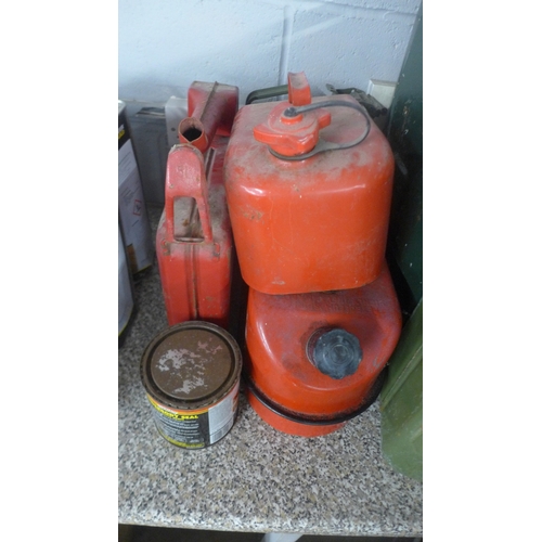 A quantity of assorted petrol cans