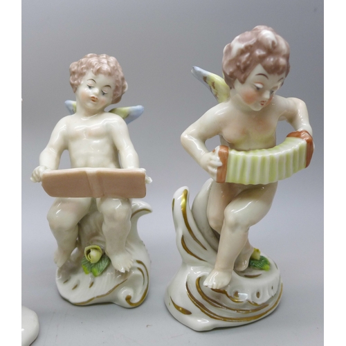 Five Capodimonte porcelain cherub figures each playing musical ...