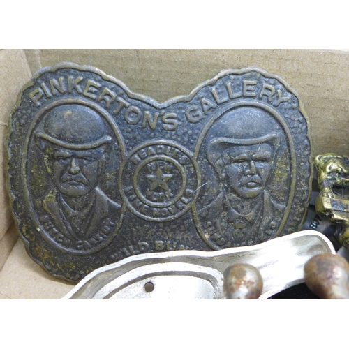 An AA car badges, three bus conductor badges, bottle openers ...