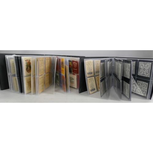 An extensive collection of silk cigarette card inserts and embroidered ...