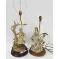 A large Capodimonte figural table lamp by B. Merli, portraying playing ...