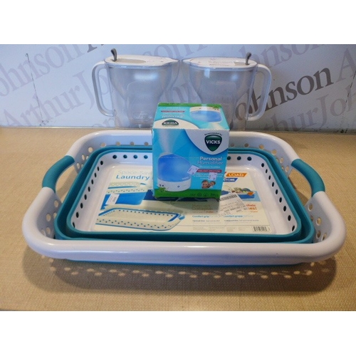 Two Brita max jugs, Vicks humidifier and a pop and load laundry basket ...