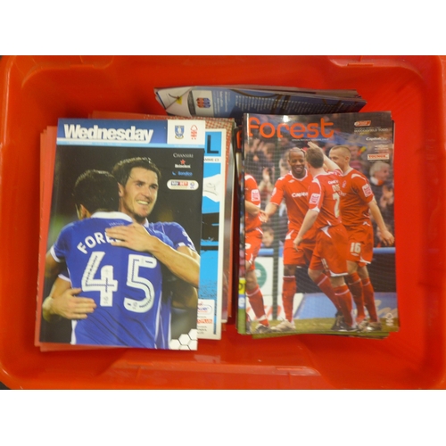 A quantity of Nottingham Forest programmes and other football memorabilia