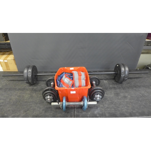 A collection of weight lifting/training weights including 4 dumbbells ...