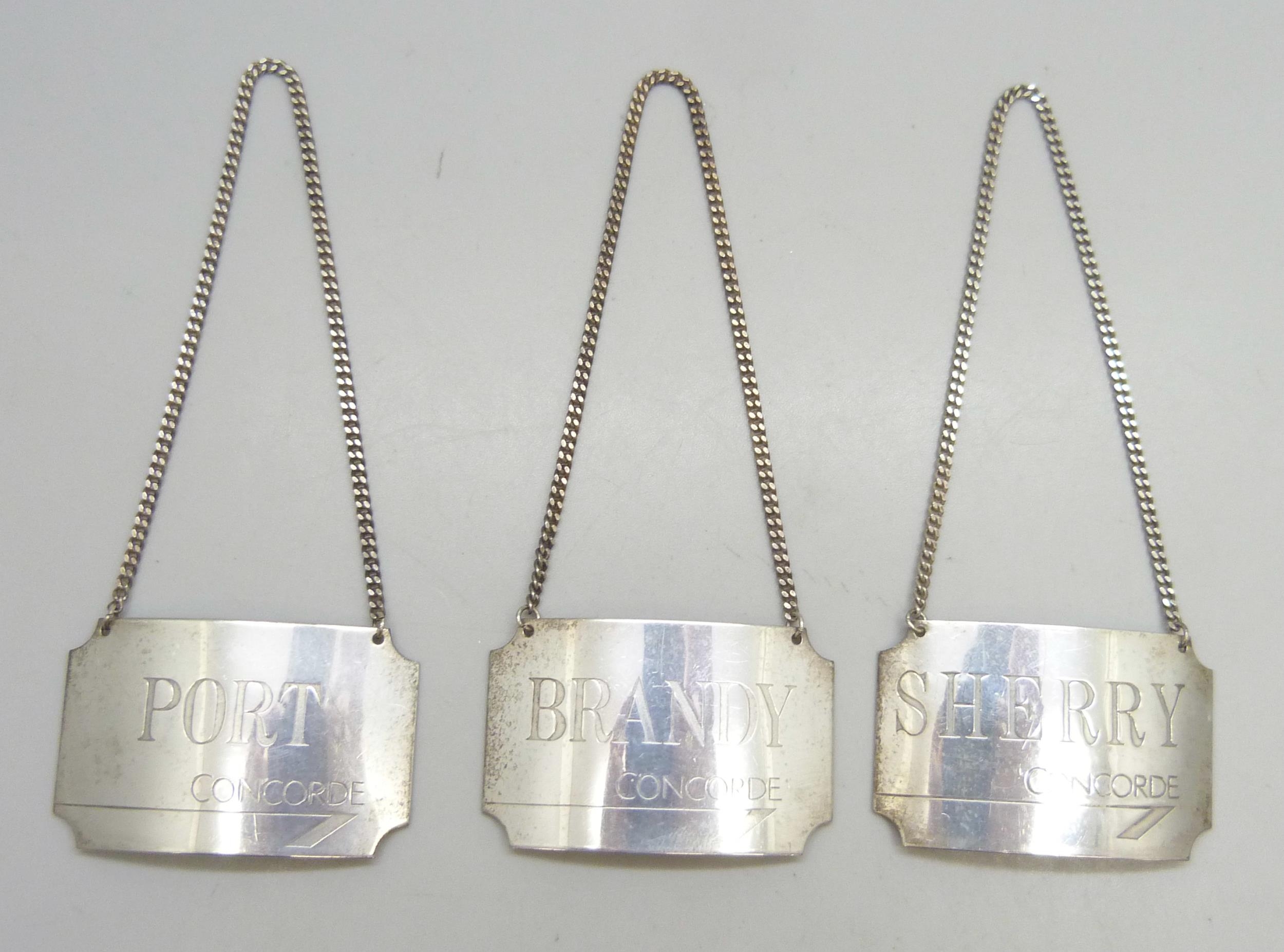 Three silver Concorde wine labels - Brandy, Port and Sherry, 44g total ...